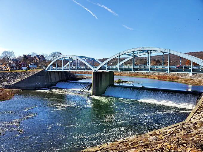 Not just any bridge&mdash;a gateway between worlds. The water below rushes forward while the structure above connects communities that time nearly forgot.