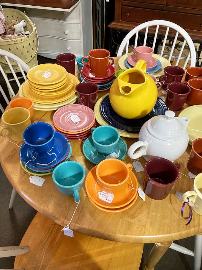 A rainbow explosion of vintage Fiestaware that makes modern kitchen collections look like they're trying too hard.