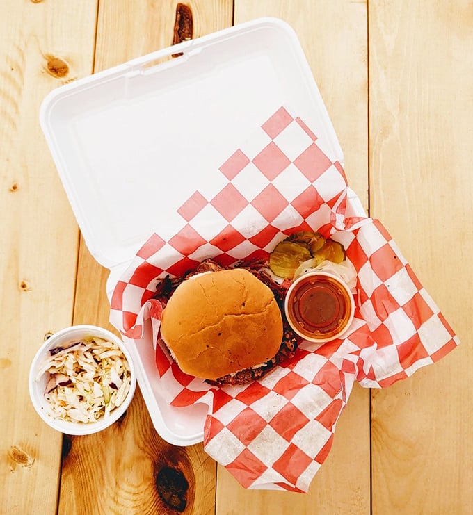 A proper brisket sandwich doesn't need fancy accessories—just meat that's lived its best smoky life, nestled in a bun that knows when to step aside.