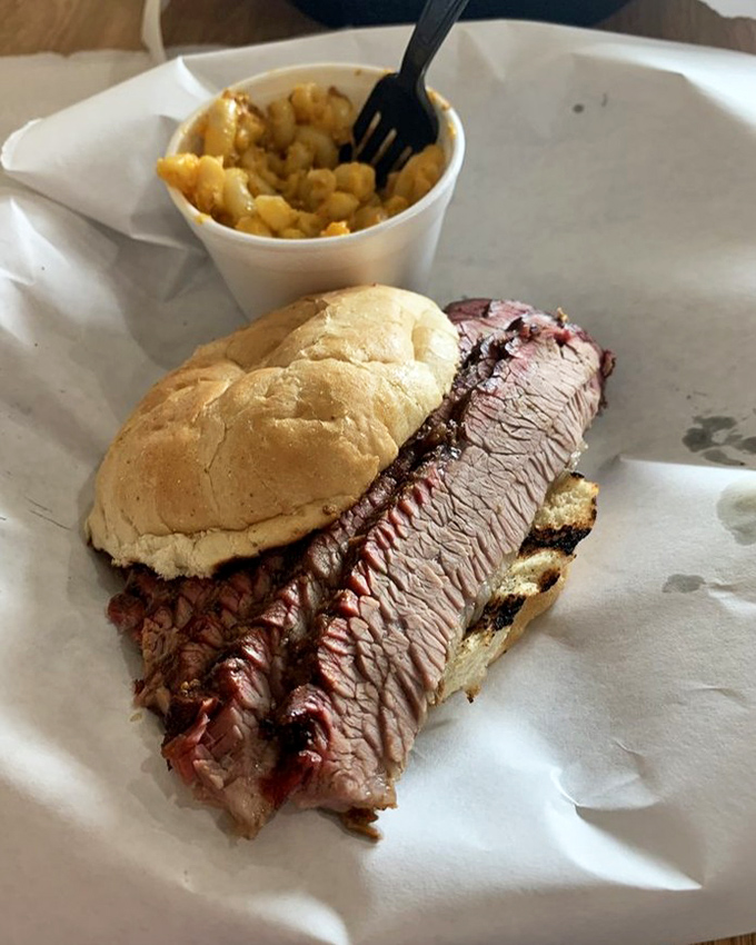 Brisket sandwich that makes Texans nervous. That smoke ring is the barbecue equivalent of Olympic gold&mdash;hours of patience transformed into meat magic.