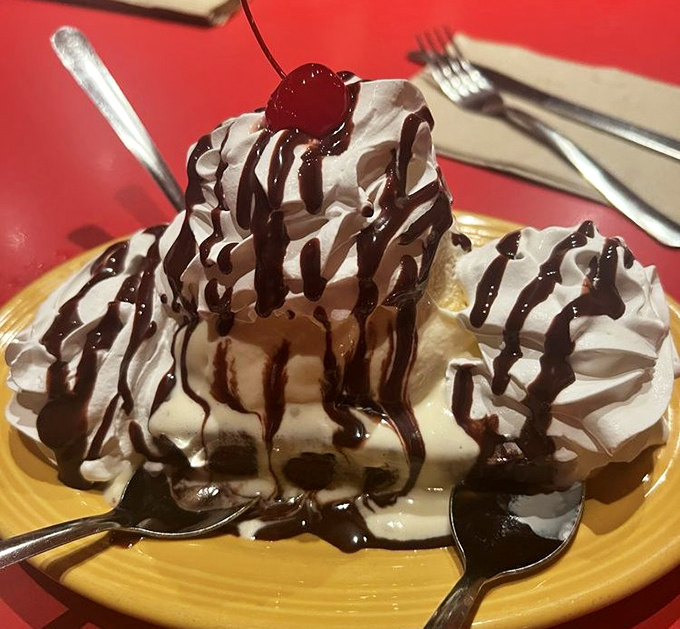 A mountain of whipped cream and chocolate sauce that doesn't just satisfy your sweet tooth &ndash; it throws a parade for it.