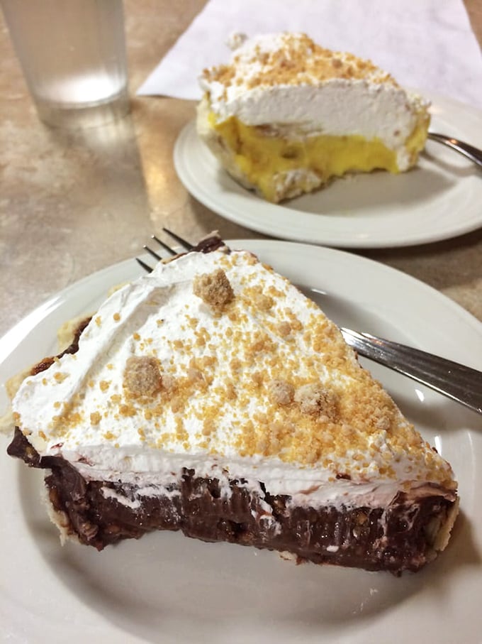 Chocolate cream pie with a mountain of whipped topping &ndash; proof that sometimes the best things in life come in triangular form.