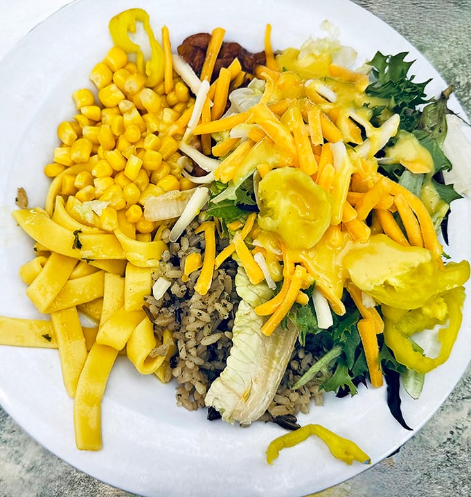 A buffet plate that tells the story of Midwestern abundance&mdash;where vegetables, rice, and cheese coexist in peaceful, delicious harmony. No food group left behind.