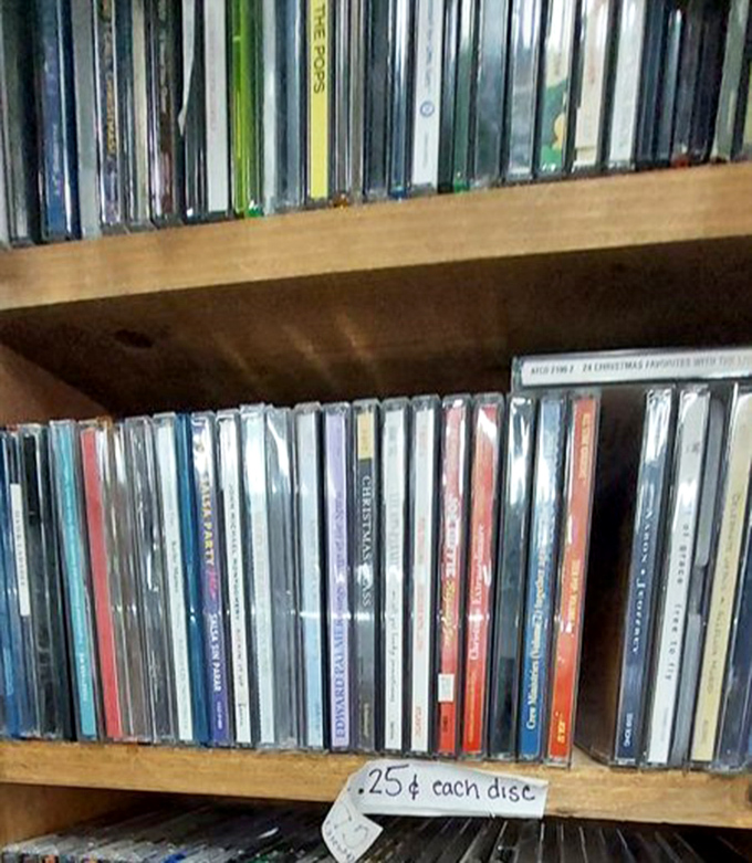 CDs at 25 cents each? That's not shopping—that's practically being paid to build your own time capsule of musical nostalgia.