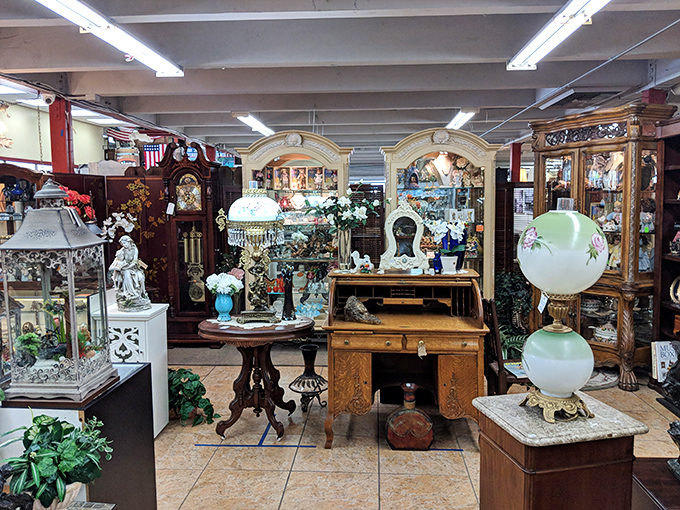 Victorian elegance meets timeless craftsmanship in this display. These aren't just cabinets; they're wooden time capsules waiting for their next chapter.
