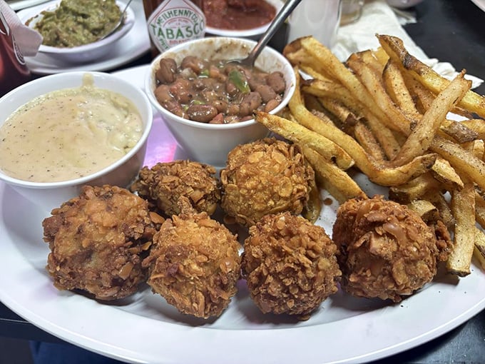 Golden-fried calf fries for the adventurous eater, served with crispy fries and beans&mdash;a Texas delicacy that's earned its loyal following.