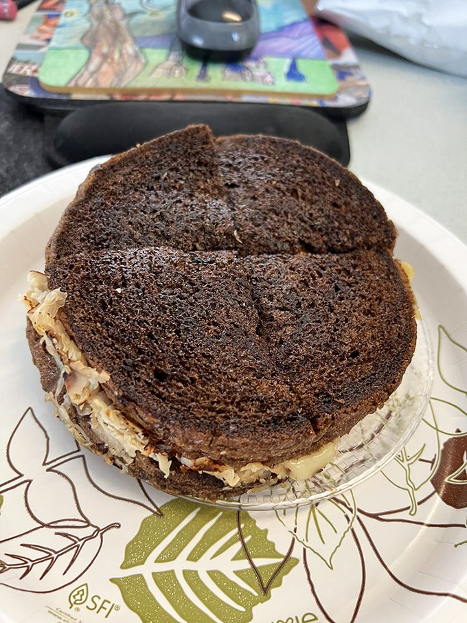 Behold the California Reuben in its architectural splendor. Like a well-designed skyscraper, each layer contributes to both structural integrity and flavor magnificence.