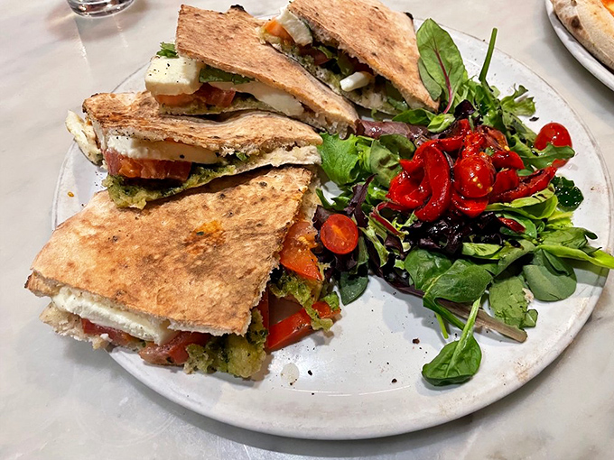 The panini arrives like an edible work of art, with fresh ingredients playing together as harmoniously as a well-rehearsed jazz quartet.