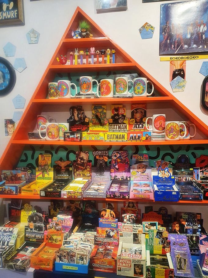 This triangular shrine to pop culture nostalgia houses everything from Pez dispensers to vintage trading cards. Childhood memories, now collectible treasures.