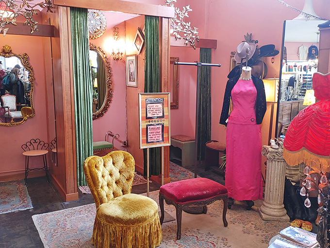 The dressing room area looks like it was plucked from a 1940s Hollywood starlet's boudoir. That gold velvet chair has heard more fashion deliberations than Joan Rivers.