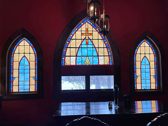 Stained glass windows transform ordinary sunlight into jewel-toned magic. The perfect spot to contemplate life's mysteries or just enjoy a quiet moment.