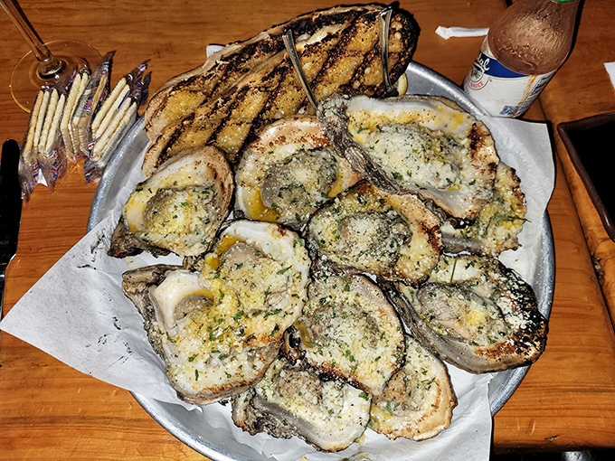 These charbroiled oysters aren't just cooked, they're transformed&mdash;garlic butter and parmesan creating a symphony that would make Neptune himself applaud.