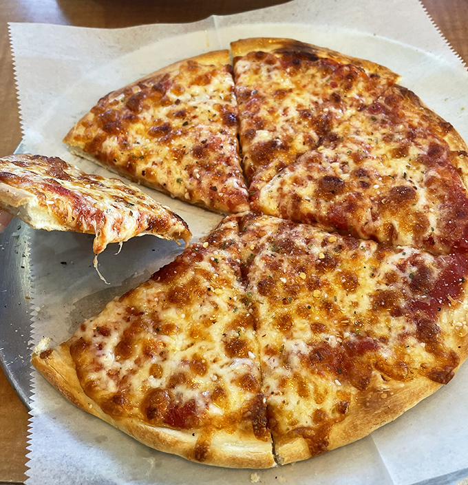 Pizza that doesn't try to reinvent the wheel&mdash;just perfectly melted cheese, a crust with character, and the kind of simplicity that never goes out of style.