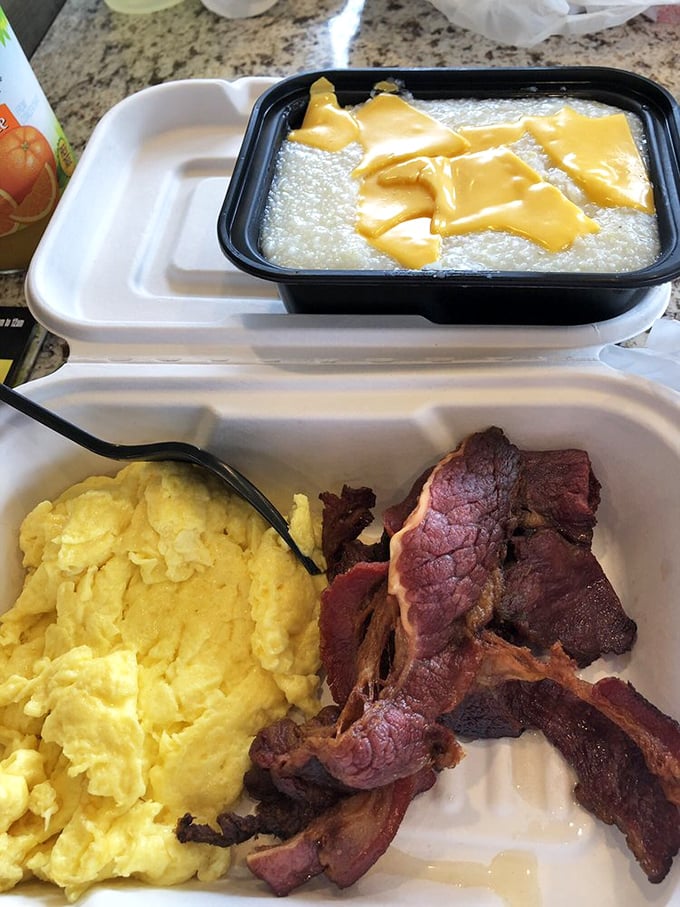 Breakfast of champions who know life's too short for bland mornings. Those grits look creamier than a Hollywood ending.