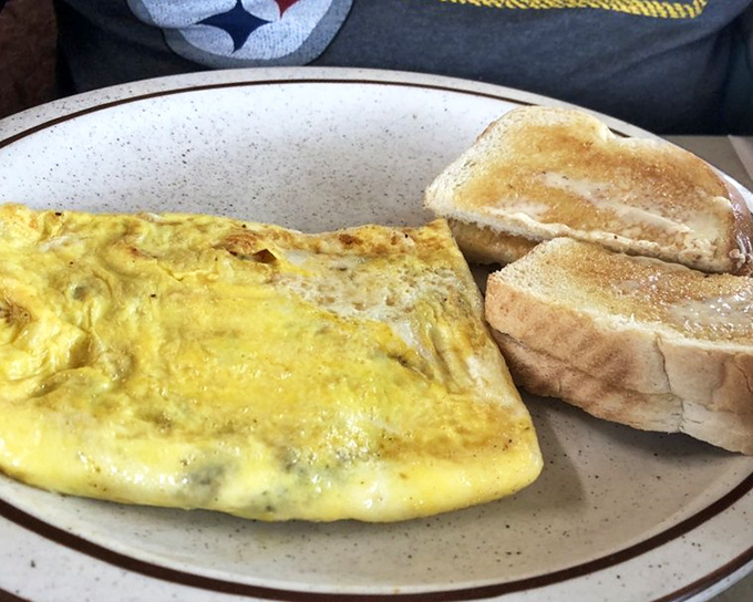 Fluffy doesn't begin to describe this omelet. It's the cloud-like creation your breakfast dreams have been missing, paired with perfectly toasted bread.