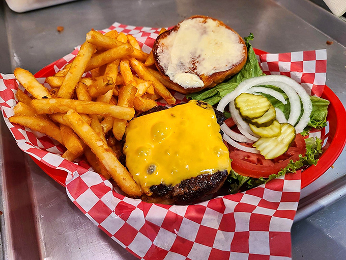 A proper cheeseburger doesn't need a fancy introduction&mdash;just melty cheese, fresh toppings, and fries that demand to be devoured.