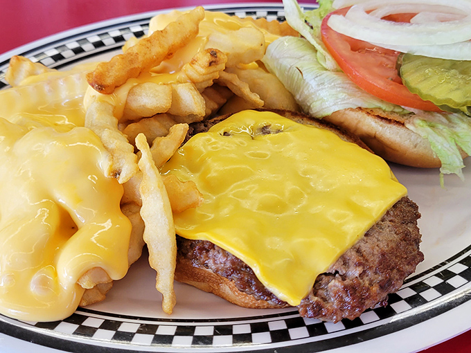 This isn't just a cheeseburger&mdash;it's edible therapy with perfectly melted American cheese hugging a hand-formed patty like it's never letting go.