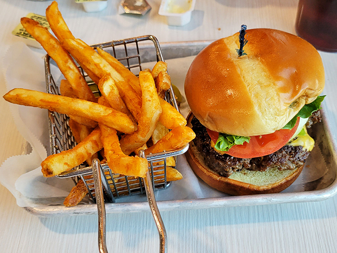 A classic burger and fries served in a wire basket. Sometimes the simplest pleasures are the most satisfying&mdash;like finding a parking spot at the mall.