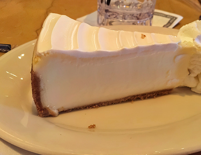 Cheesecake so pristine it looks like it's posing for a magazine cover. The perfect dense-yet-light texture that makes you close your eyes with each bite.