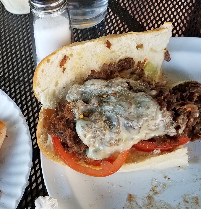 This isn't just a sandwich; it's a masterclass in the art of the cheesesteak&mdash;melty cheese cascading over seasoned meat on a pillowy roll.