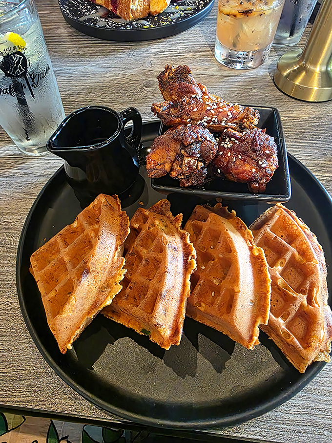 Chicken and waffles: the ultimate "why choose one?" solution. These golden waffles look ready to support your brunch dreams and late-night cravings alike.