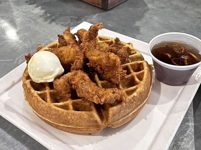 Chicken and waffles: the breakfast equivalent of a perfect high-five. That golden waffle cradles crispy chicken while butter slowly surrenders to warmth.
