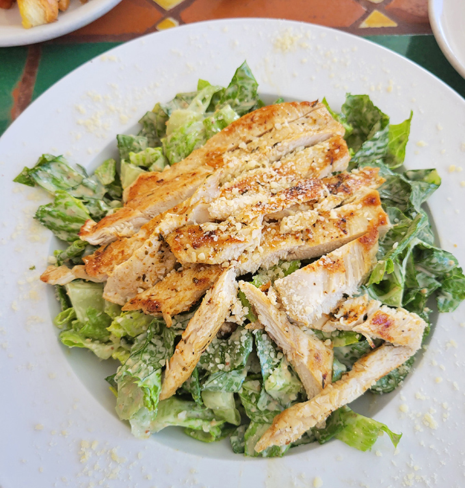 A chicken Caesar salad that actually makes you feel virtuous while indulging&mdash;crisp romaine and seasoned chicken playing perfectly together like Sinatra and Bennett.