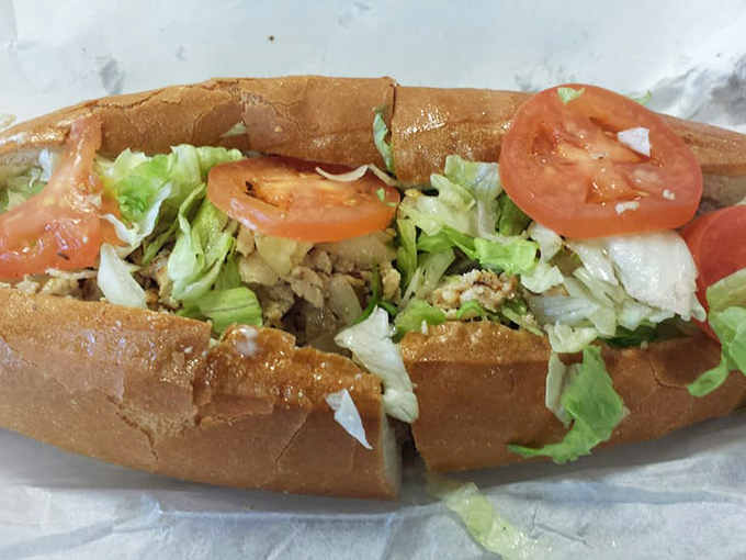 Fresh vegetables add crunch and color to this hearty sandwich. It's like a garden party where the bread is the venue.