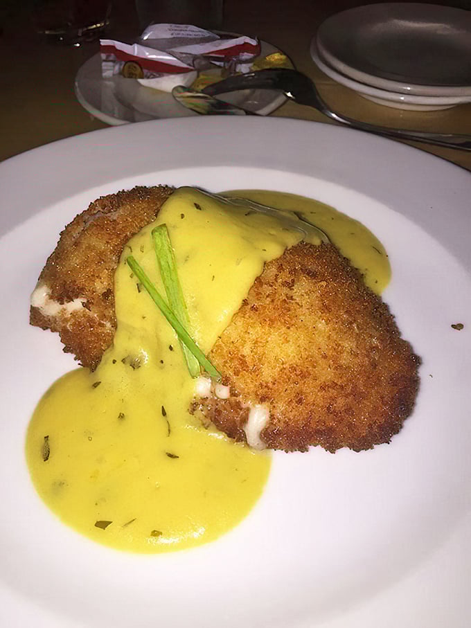 Chicken Cordon Bleu gets a lakeside makeover with a golden crust that shatters at first touch, revealing secrets beneath that sunshine-yellow sauce.