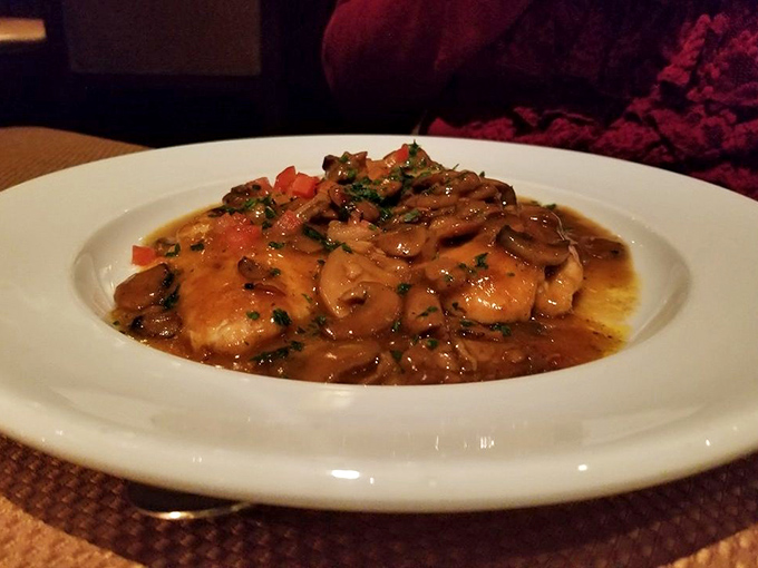 Chicken Marsala swimming in a rich, mushroom-laden sauce that would make Italian grandmothers nod in approval—comfort food elevated to an art form.