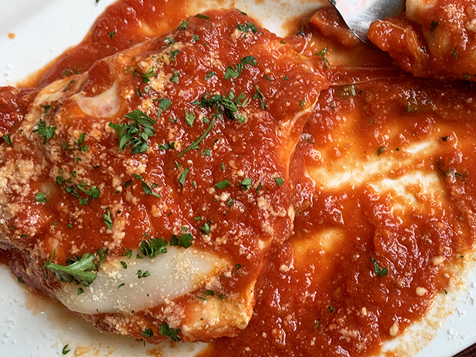 Chicken Parmigiana that doesn't mess around. That sauce isn't just red, it's a sunset over the Amalfi Coast on your plate. 