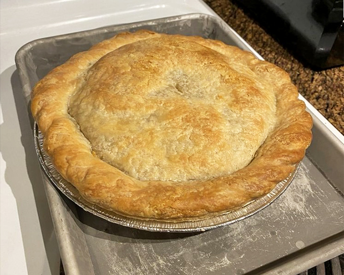 Golden, flaky crust hiding a savory treasure within&mdash;this chicken pot pie is comfort food that graduated with honors.