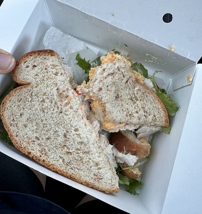 This sandwich isn't dressed for the Met Gala, but the chicken salad between those slices might make you forget your table manners.