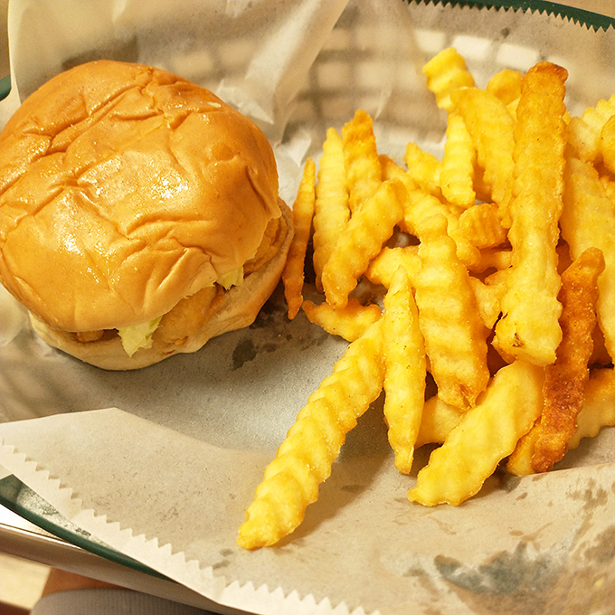 Fast food wishes it could make a sandwich this good. Crispy, golden perfection nestled in a soft bun with crinkle-cut fries standing guard.