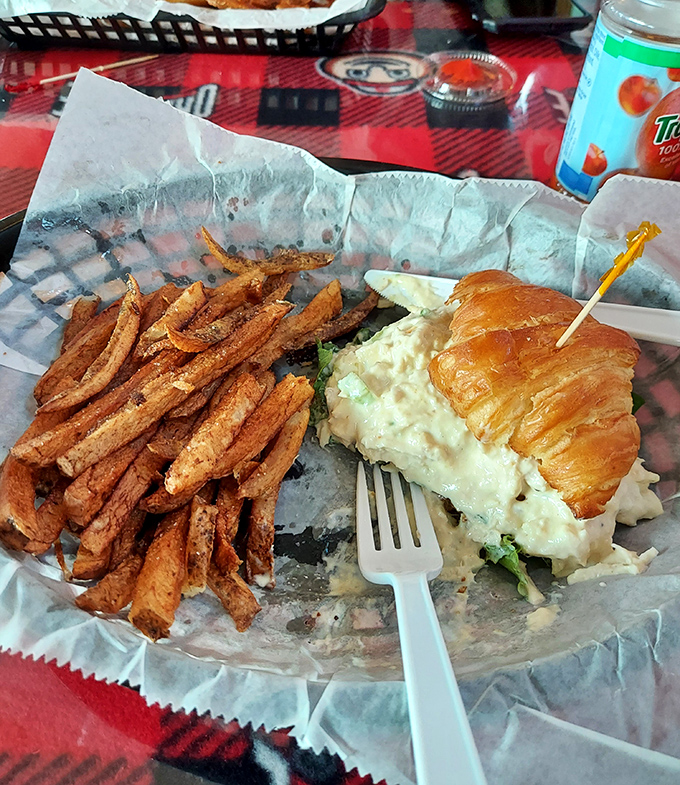 Croissants aren't just for breakfast anymore. This chicken salad sandwich and sweet potato fries combo is lunch's answer to winning the lottery.