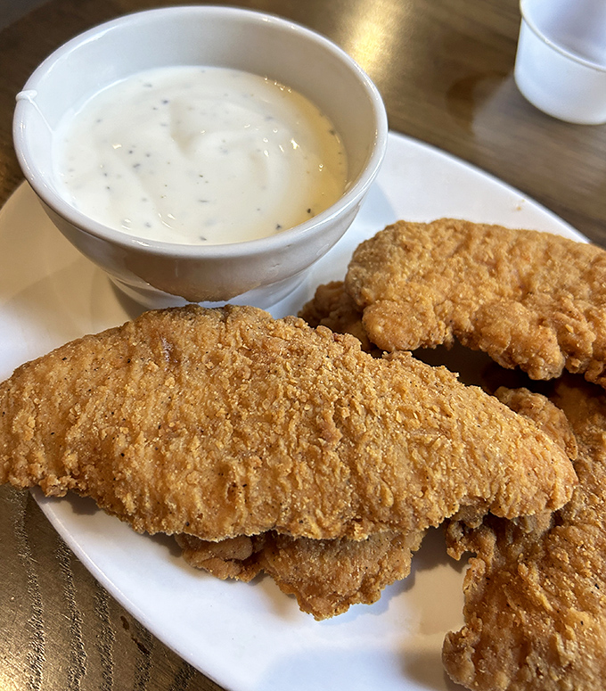 Chicken strips that put fast food versions to shame. That creamy dipping sauce? It's the supporting actor that deserves its own Oscar.