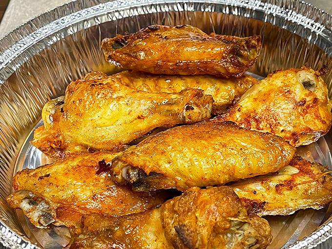 Golden-brown chicken wings that look like they've been sunbathing in deliciousness. Crispy on the outside, juicy on the inside &ndash; wing perfection achieved.