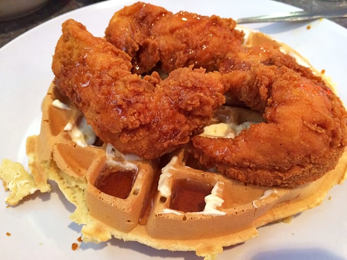 Chicken and waffles: the breakfast-lunch alliance that proves opposites don't just attract&mdash;they create culinary magic. That golden-brown chicken skin is speaking to me.