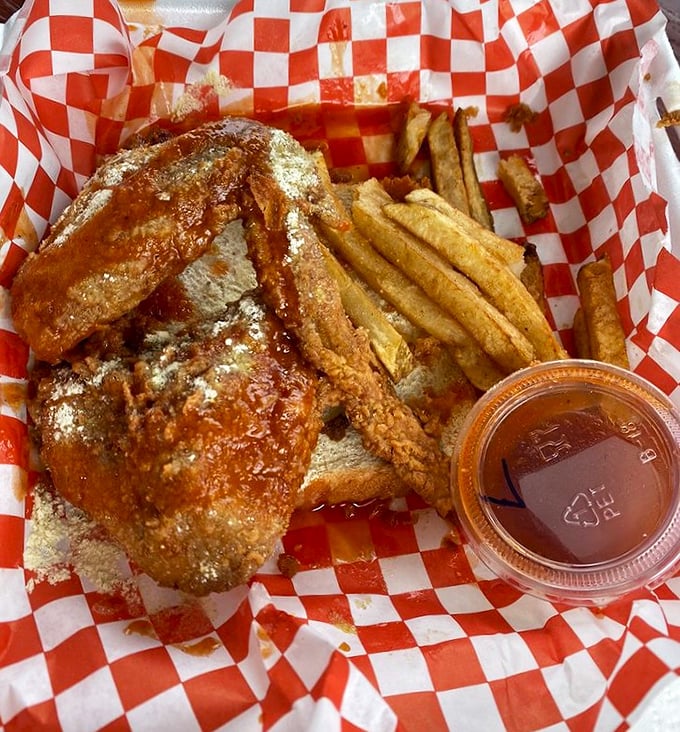 That moment when sauce meets perfectly fried chicken&mdash;a marriage so beautiful it deserves its own ceremony and possibly a tear of joy.
