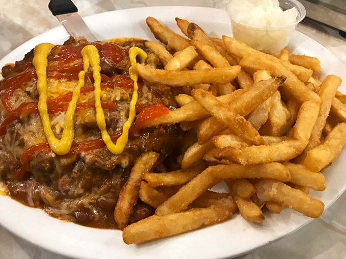 Chili, cheese, and a perfectly grilled burger&mdash;a trio more harmonious than The Supremes in their heyday.