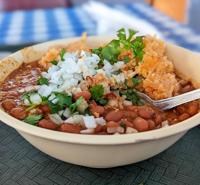 A bowl of beans and rice that somehow manages to be both humble and transcendent, like the culinary equivalent of a Willie Nelson song.