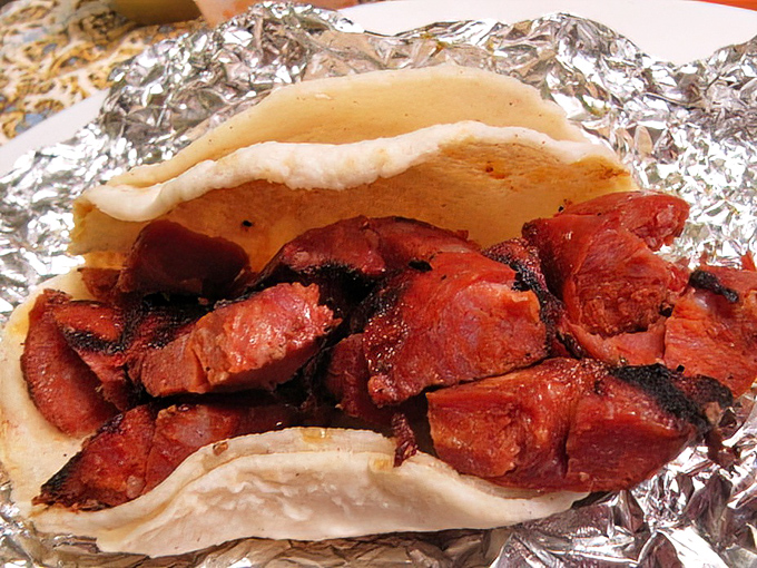 Chorizo never looked so good - this spicy sausage taco delivers flavor that'll wake up your taste buds. 