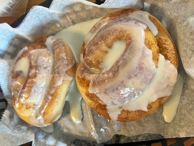 These cinnamon rolls aren't just breakfast&mdash;they're dessert masquerading as morning food, with icing so generous it's practically formal attire. 