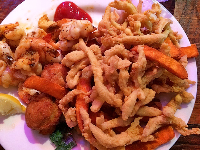A mountain of fried goodness that would make Neptune himself jealous. The clam strips and seafood medley showcase Georgia's coastal bounty.