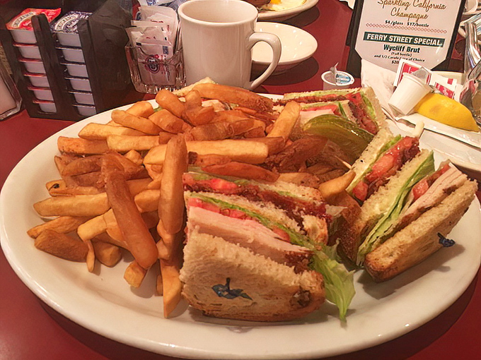 This club sandwich isn't playing around&mdash;it's a skyscraper of flavor that requires both hands and possibly an engineering degree.