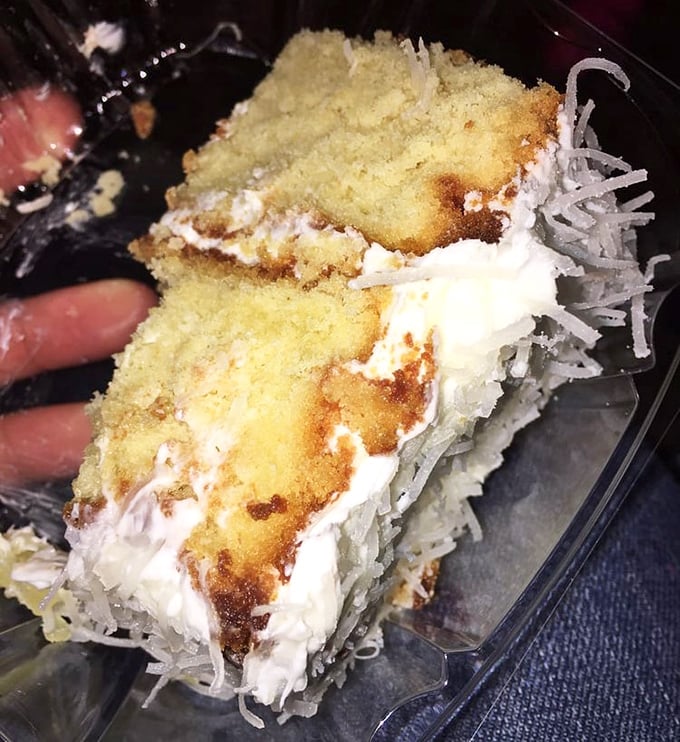 Coconut cake so divine it should have its own gospel choir. Each layer tells a different chapter in the story of dessert perfection.