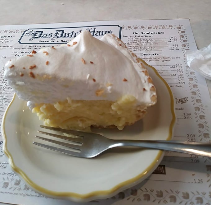 Coconut cream pie that would make your grandmother both proud and jealous. That meringue is performing architectural miracles.