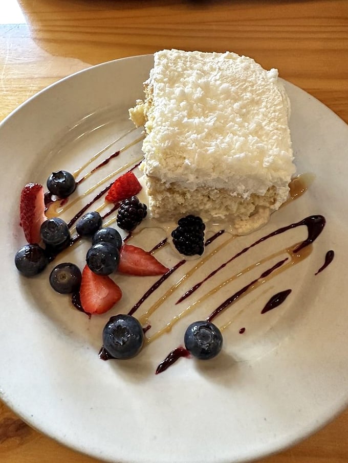 This Coconut Tres Leches is what angels eat on their day off—light, airy, and surrounded by nature's candy.