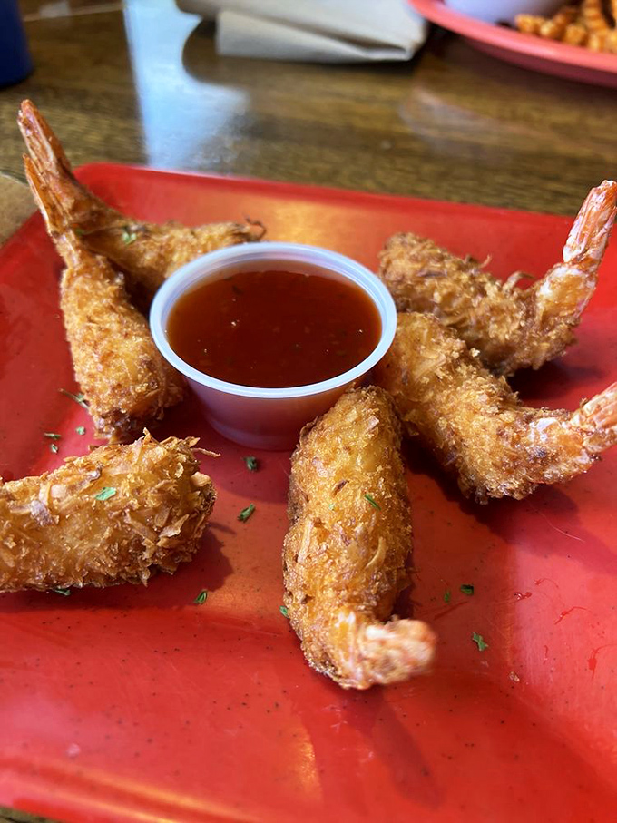 Coconut shrimp that would make even a coconut-skeptic reconsider their life choices&mdash;crispy, golden-brown treasures with that sweet-savory balance that dreams are made of.