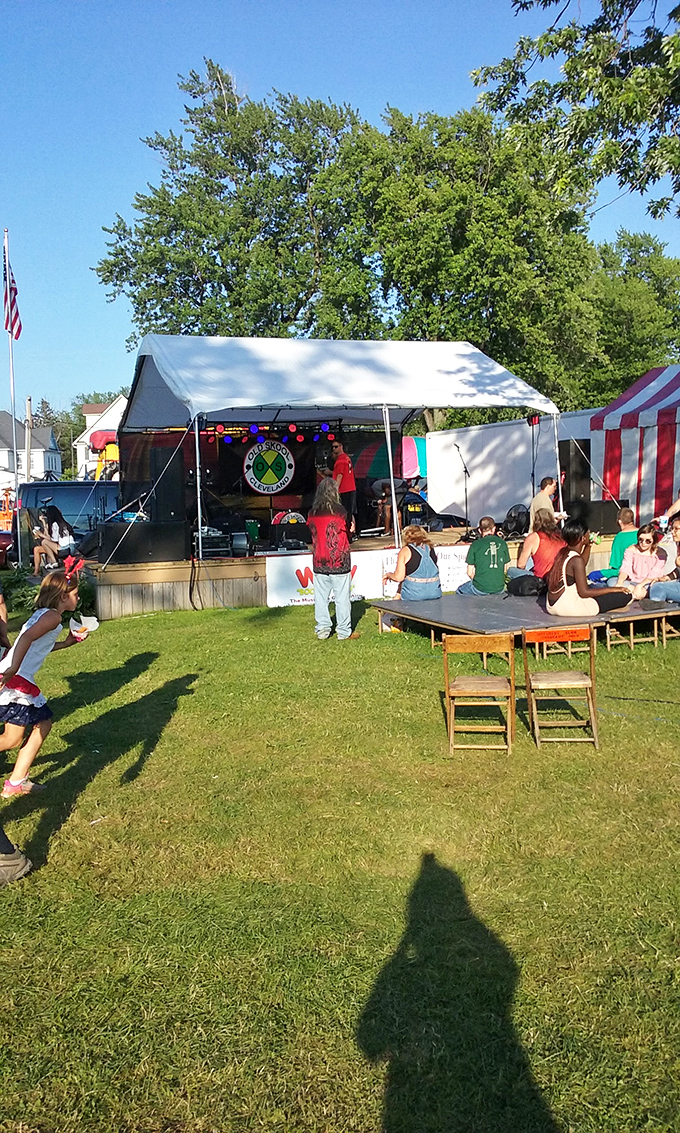 Summer festivals bring the community together under blue skies, where live music and laughter create the soundtrack of small-town joy.